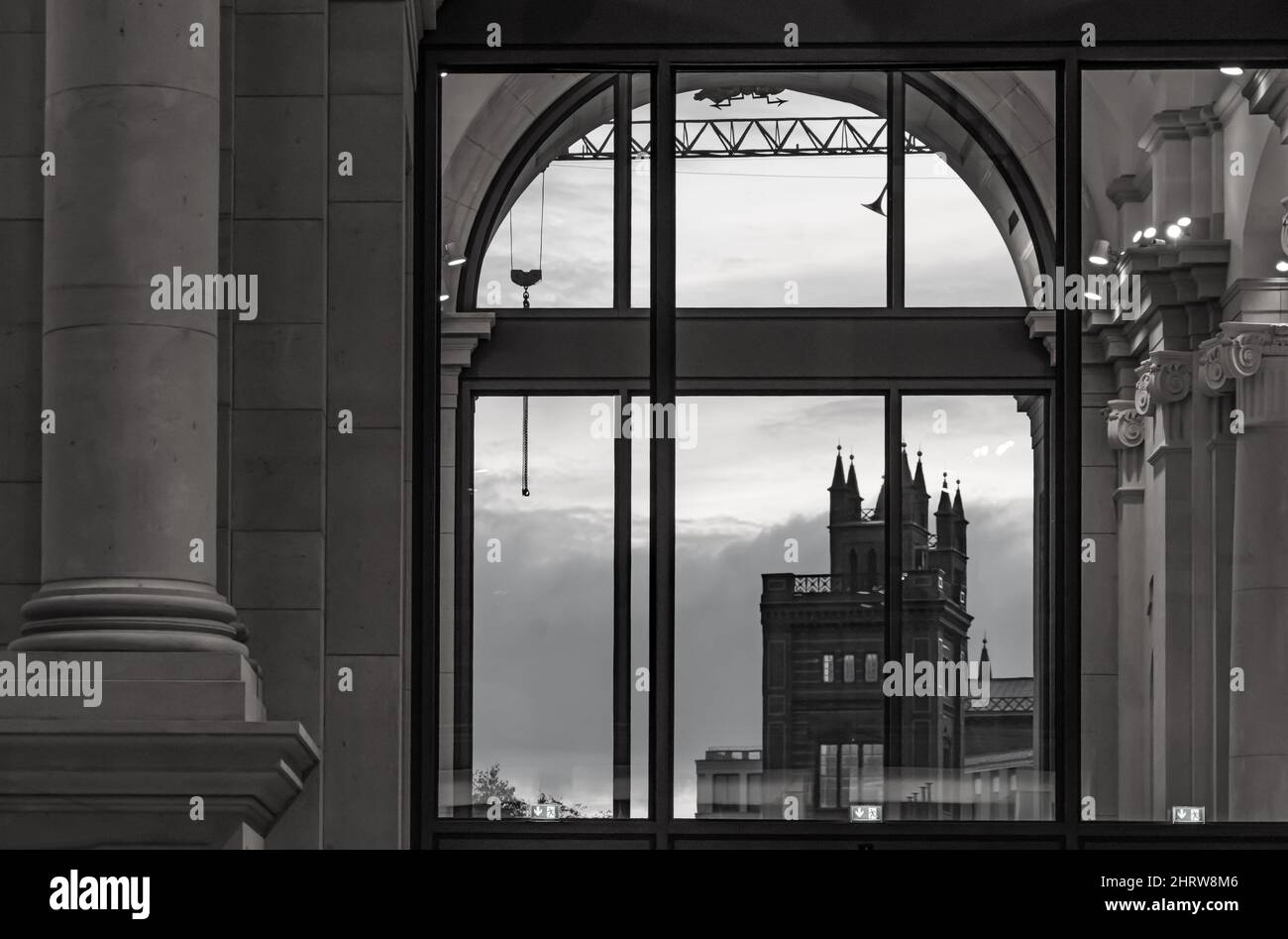 Grayscale shot of a building seen from windows of the Humboldt Forum in ...
