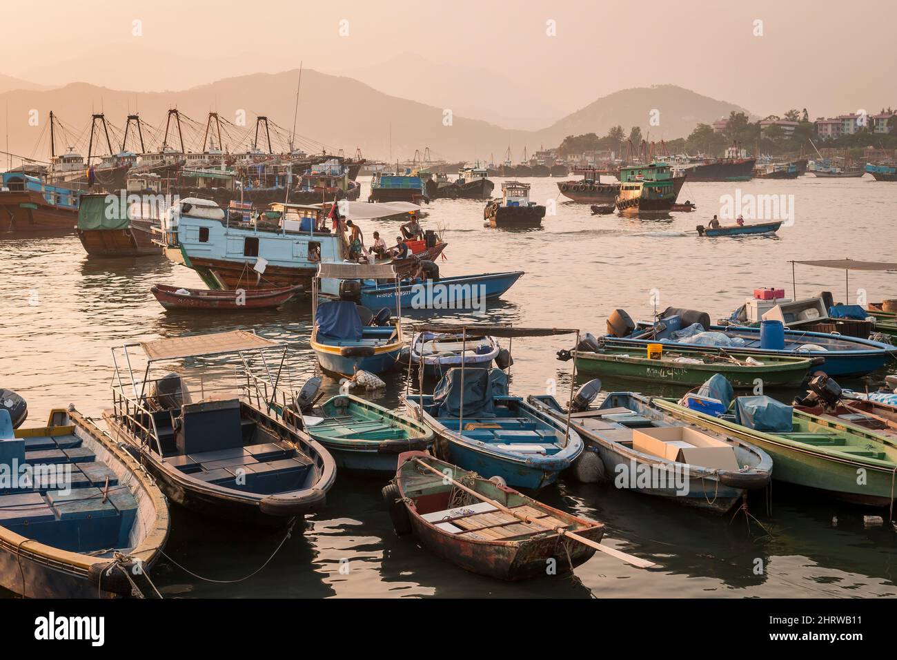 Local fishing boats, including traditional wooden junks, at the ...