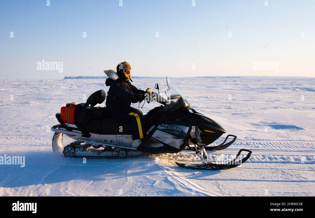 An RCMP officer takes part in an arctic ranger patrol of the Arctic ...