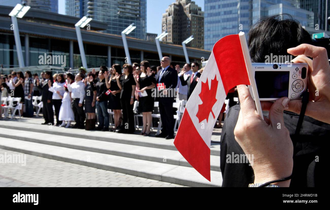 Canadian holding a flag hi-res stock photography and images - Alamy