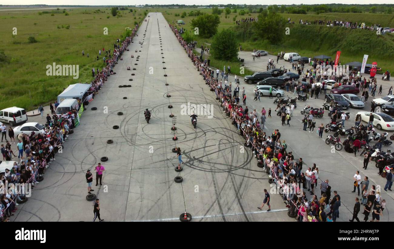 Drag recing. Car competition. Many people cars. Top view Stock Photo ...