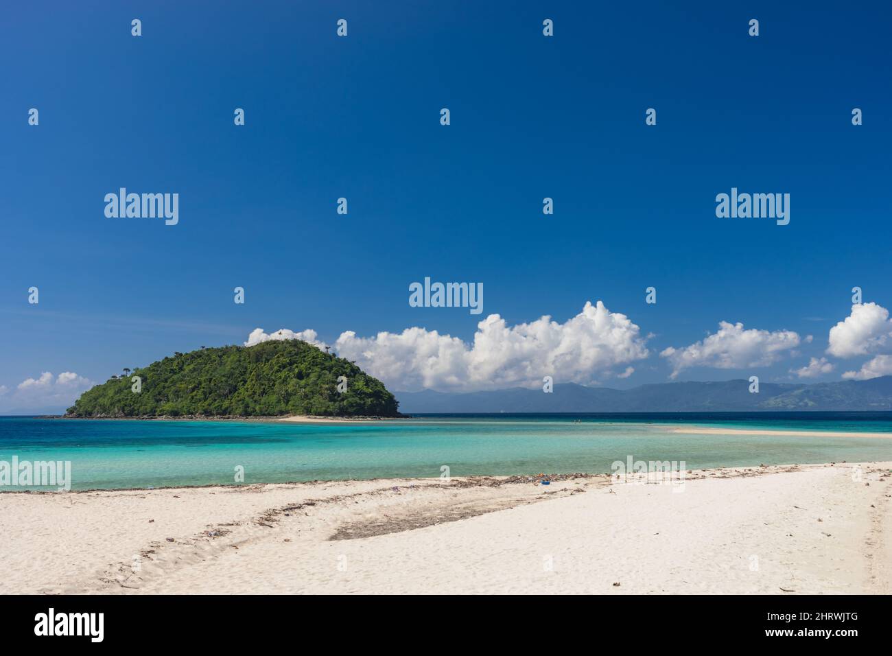 Landscape of the Bon Bon Beach surrounded by hills and sea in Romblon ...