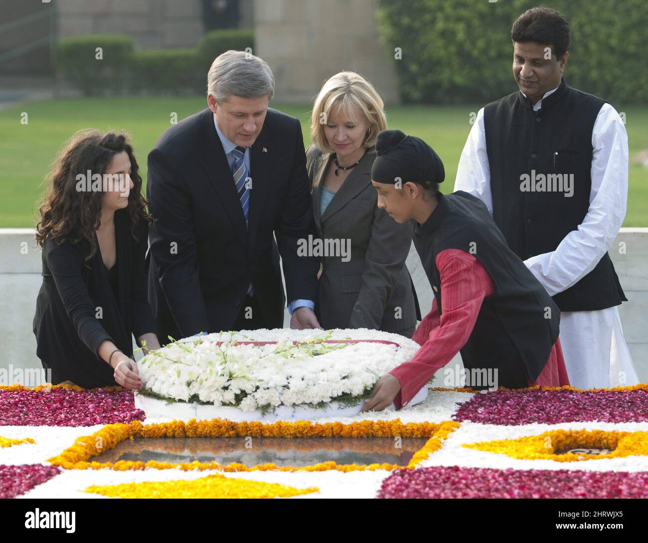 Canadian Prime Minister Stephen Harper and his wife Laureen place a ...