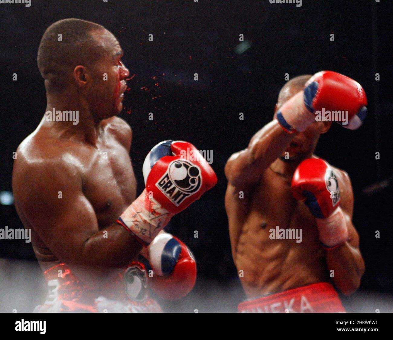 Blood gushes from Porto Rico's Joan Guzman's face after Ali Funeka of ...