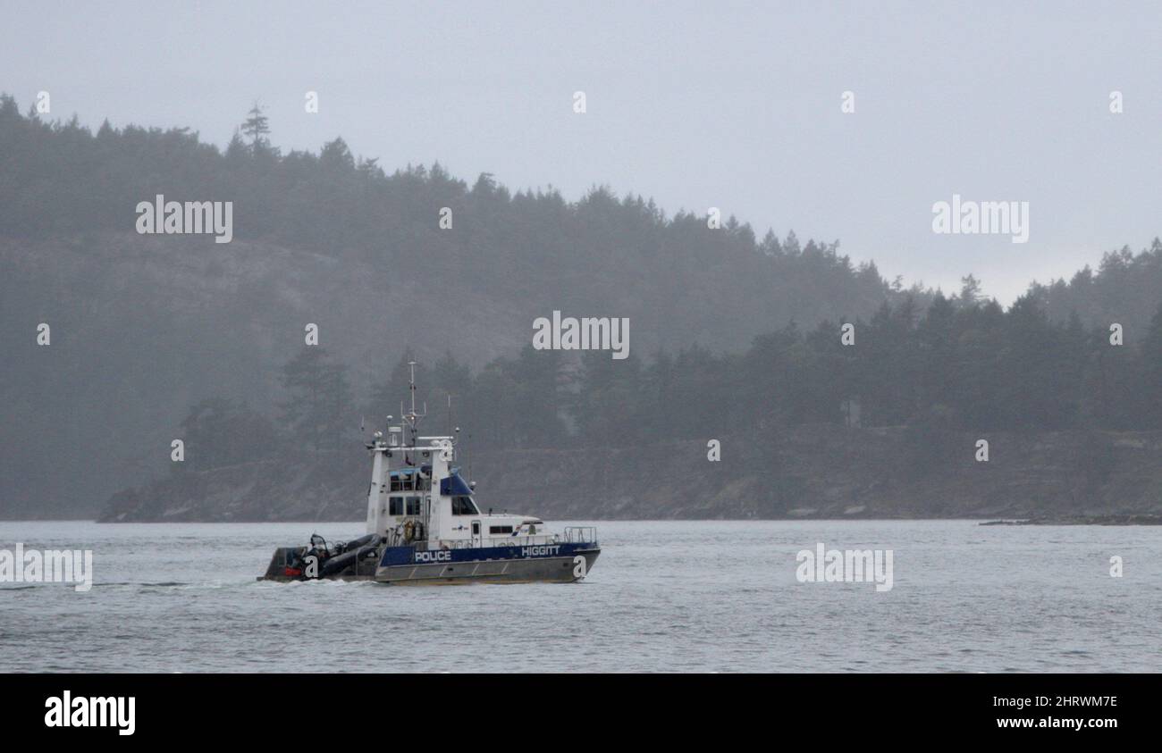 An RCMP boat patrols Lyall Harbour at Saturna Island, B.C., on Monday ...