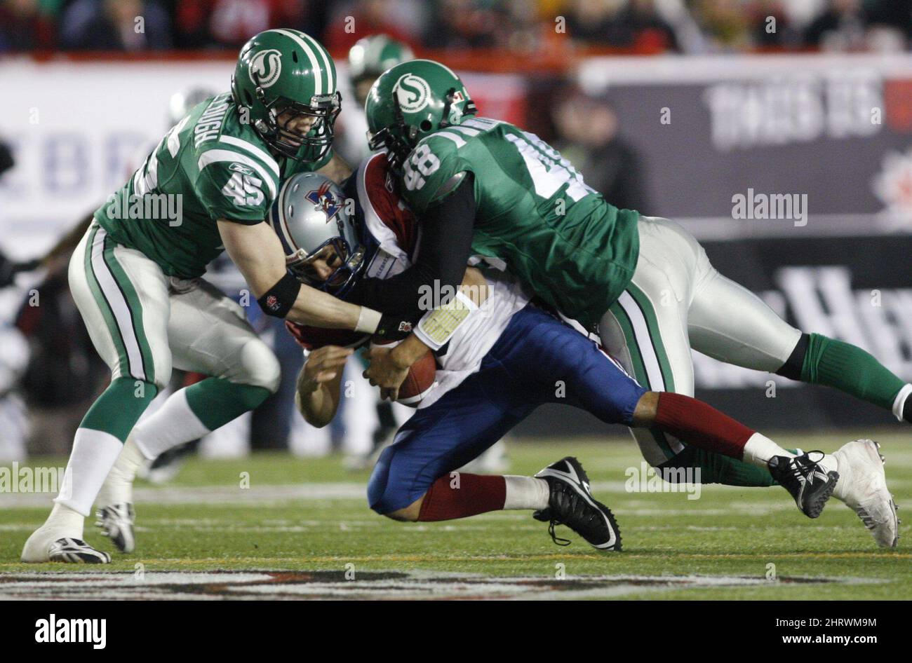 Saskatchewan Roughriders linebackers Mike McCullough (left) and Renauld ...