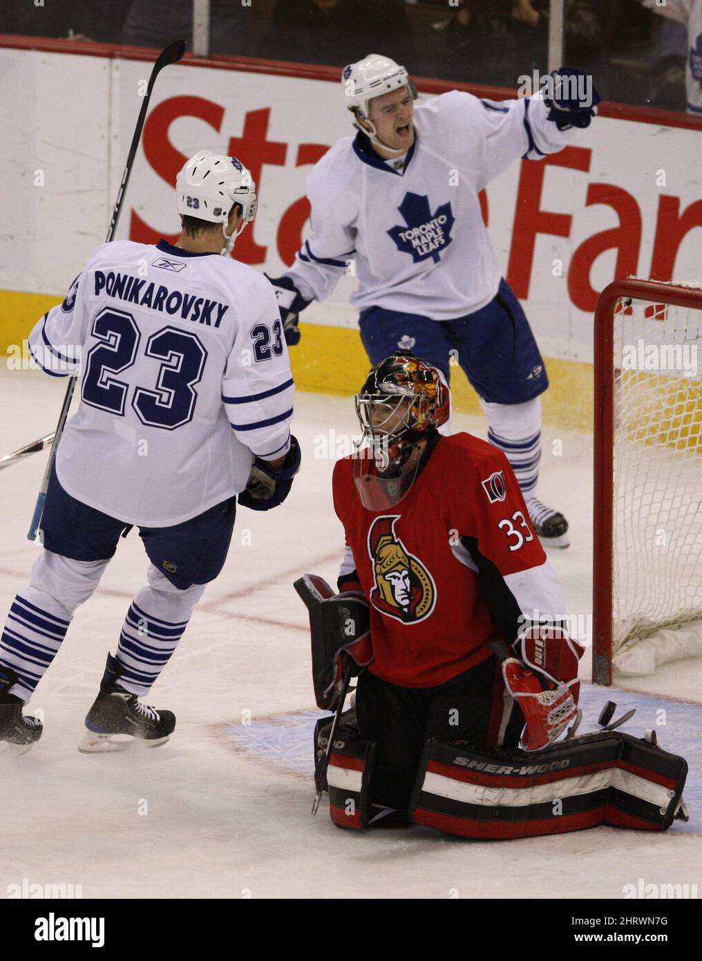 Toronto Maple Leaf Phil Kessel (81) celebrates his goal with teammate ...
