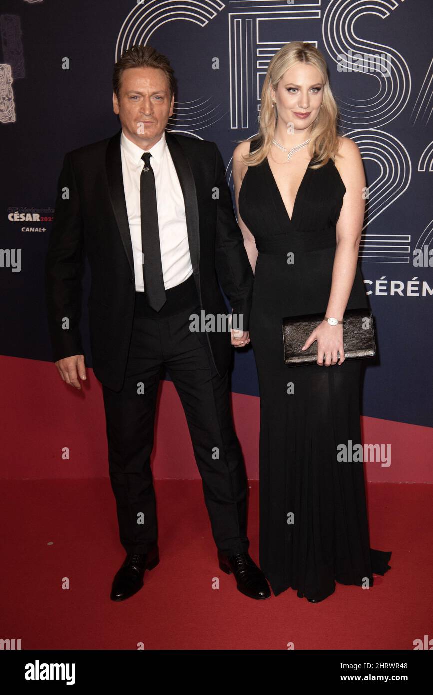 Paris, France. 26th Feb, 2022. Benoît Magimel and Margot Pelletier ...