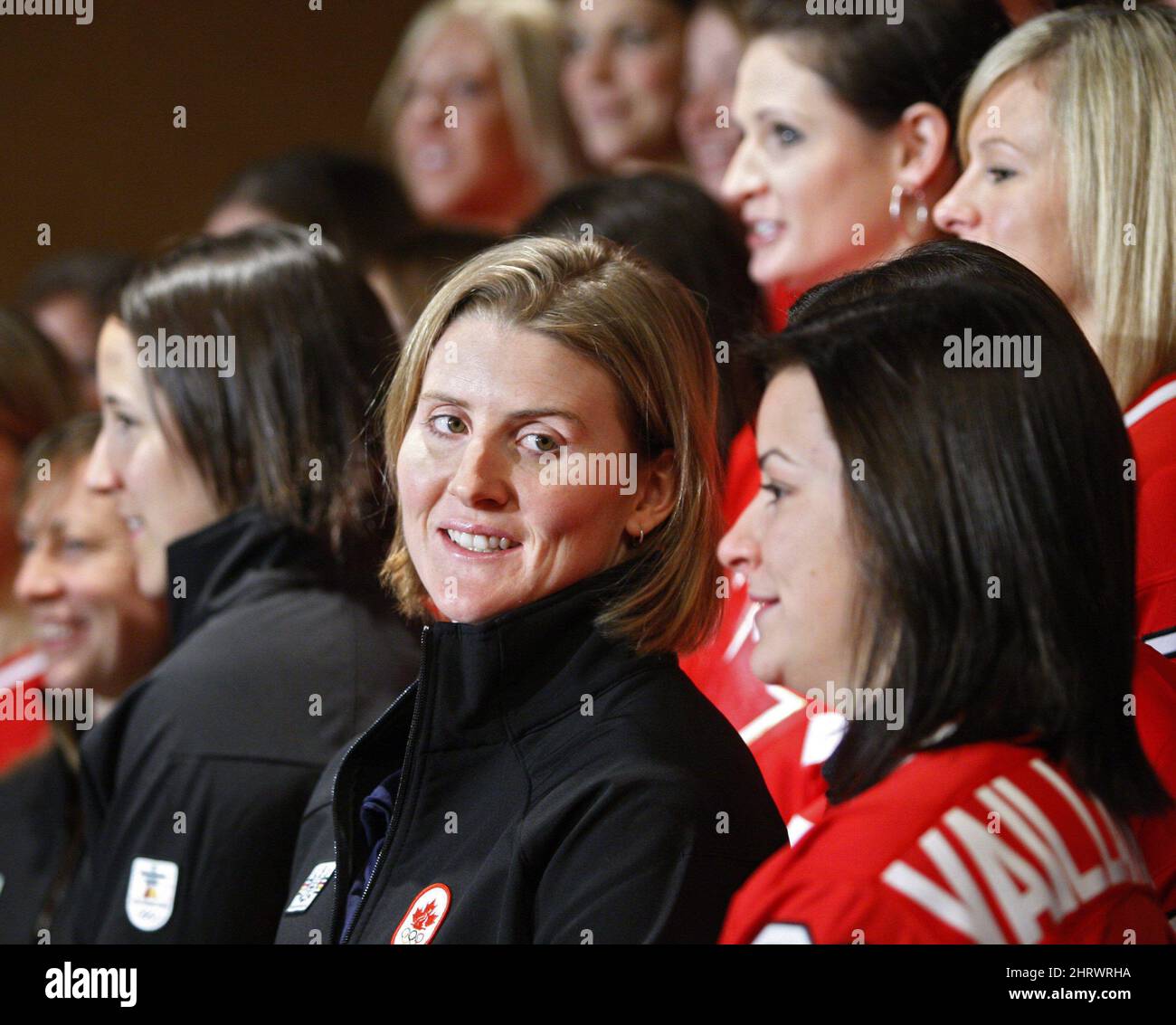 Captain Hayley Wickenheiser (centre) looks over at teammate Sarah ...