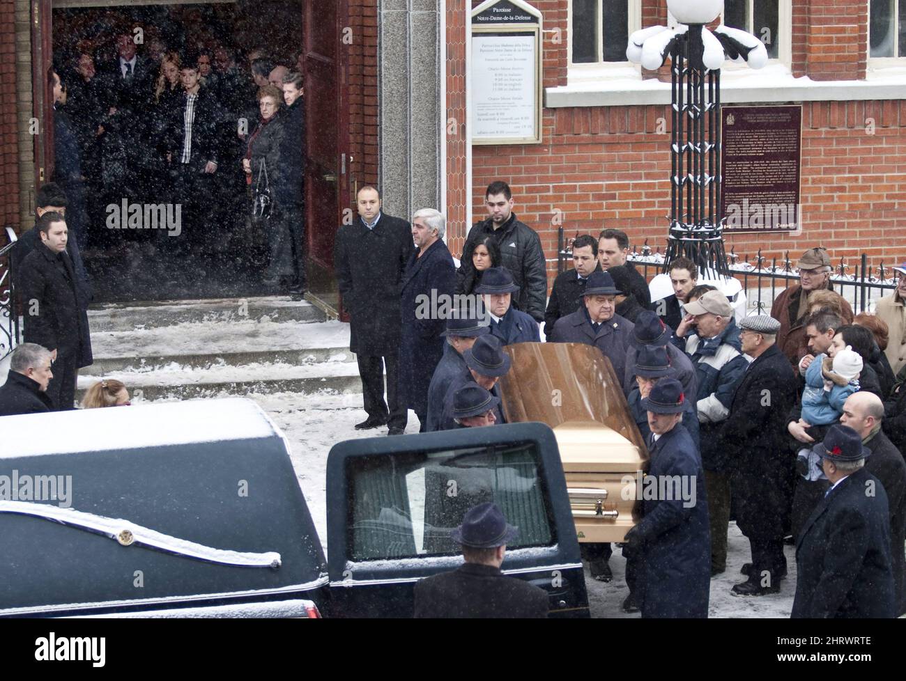 The casket bearing the remains of Nick Rizzuto is carried out of church ...