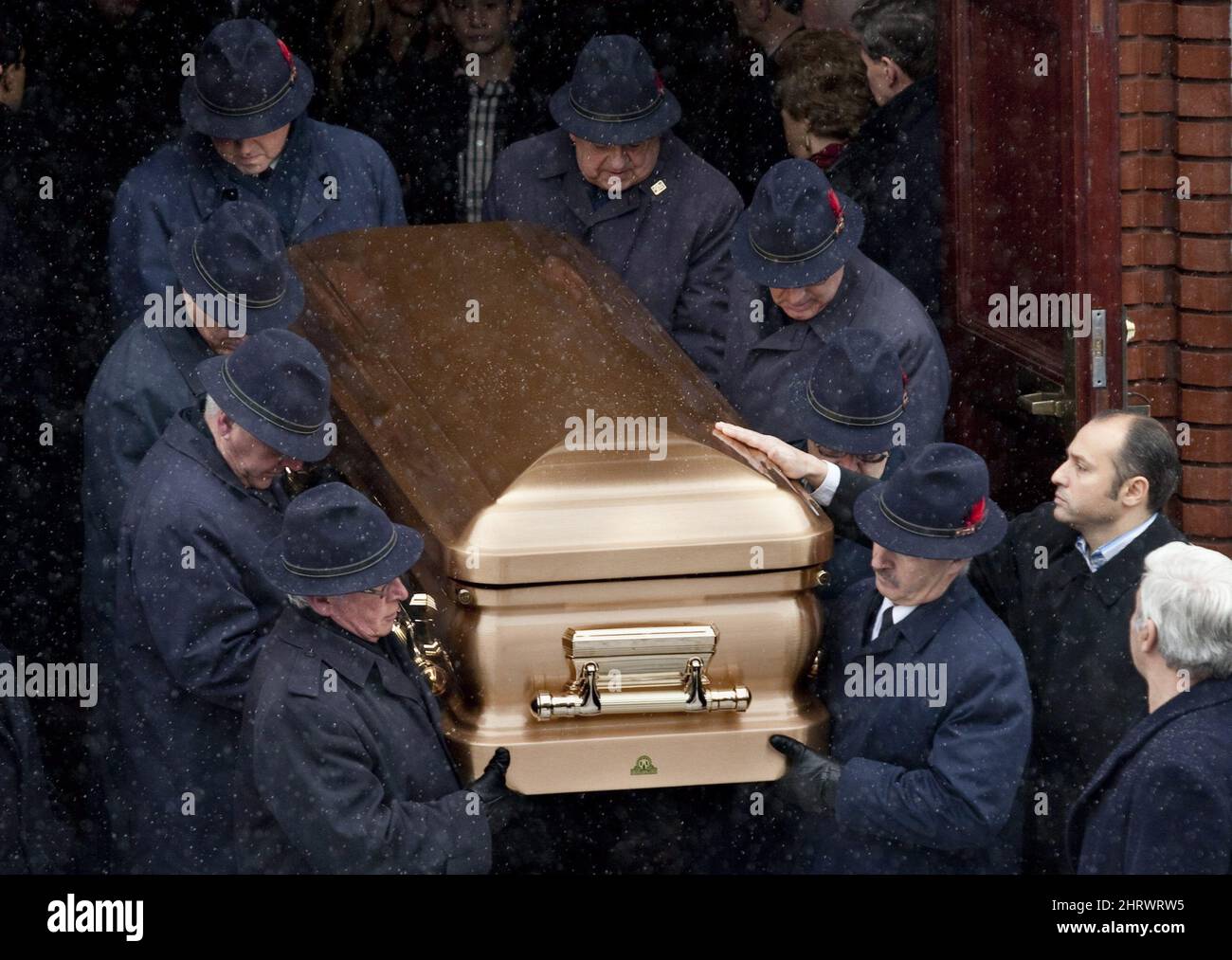 The casket bearing the remains of Nick Rizzuto is carried out of church ...