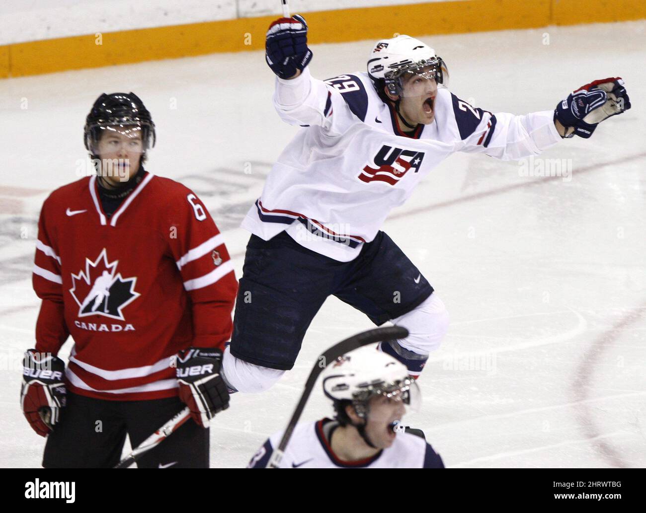 Team USA's Jerry D'Amigo celebrates a goal by teammate John Carlson as ...