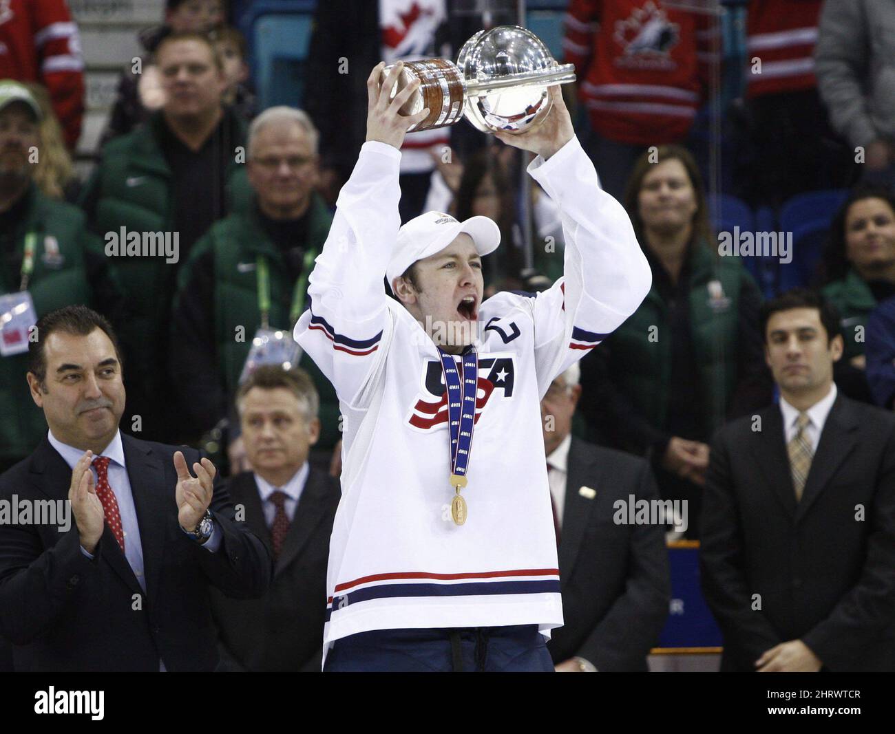 Team USA's captain Derek Stepan hoists the trophy after beating Team ...