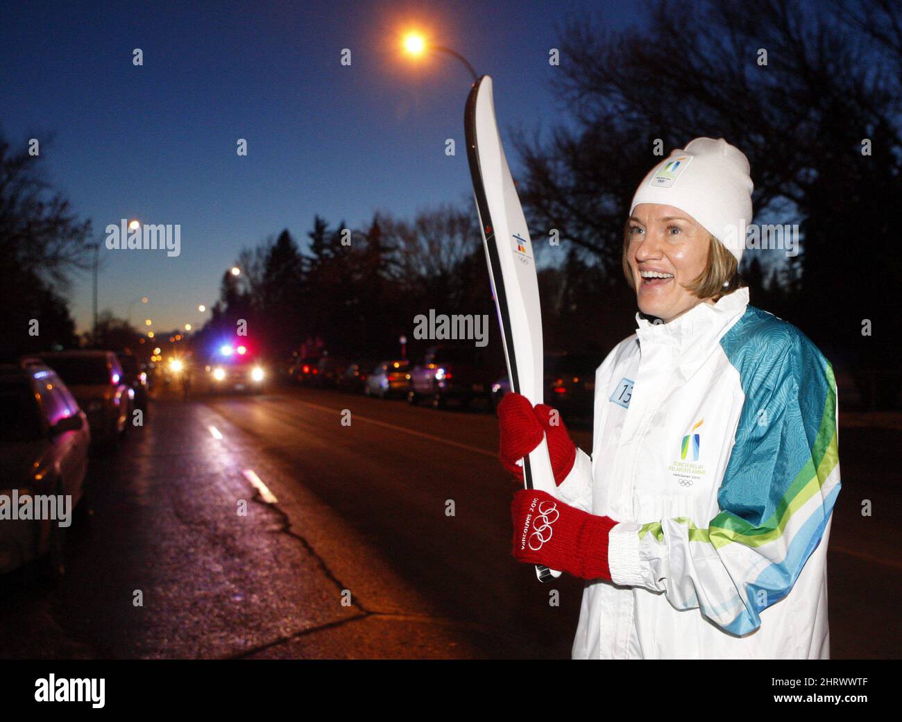 The Canadian Press sports reporter/editor Donna Spencer holds the ...