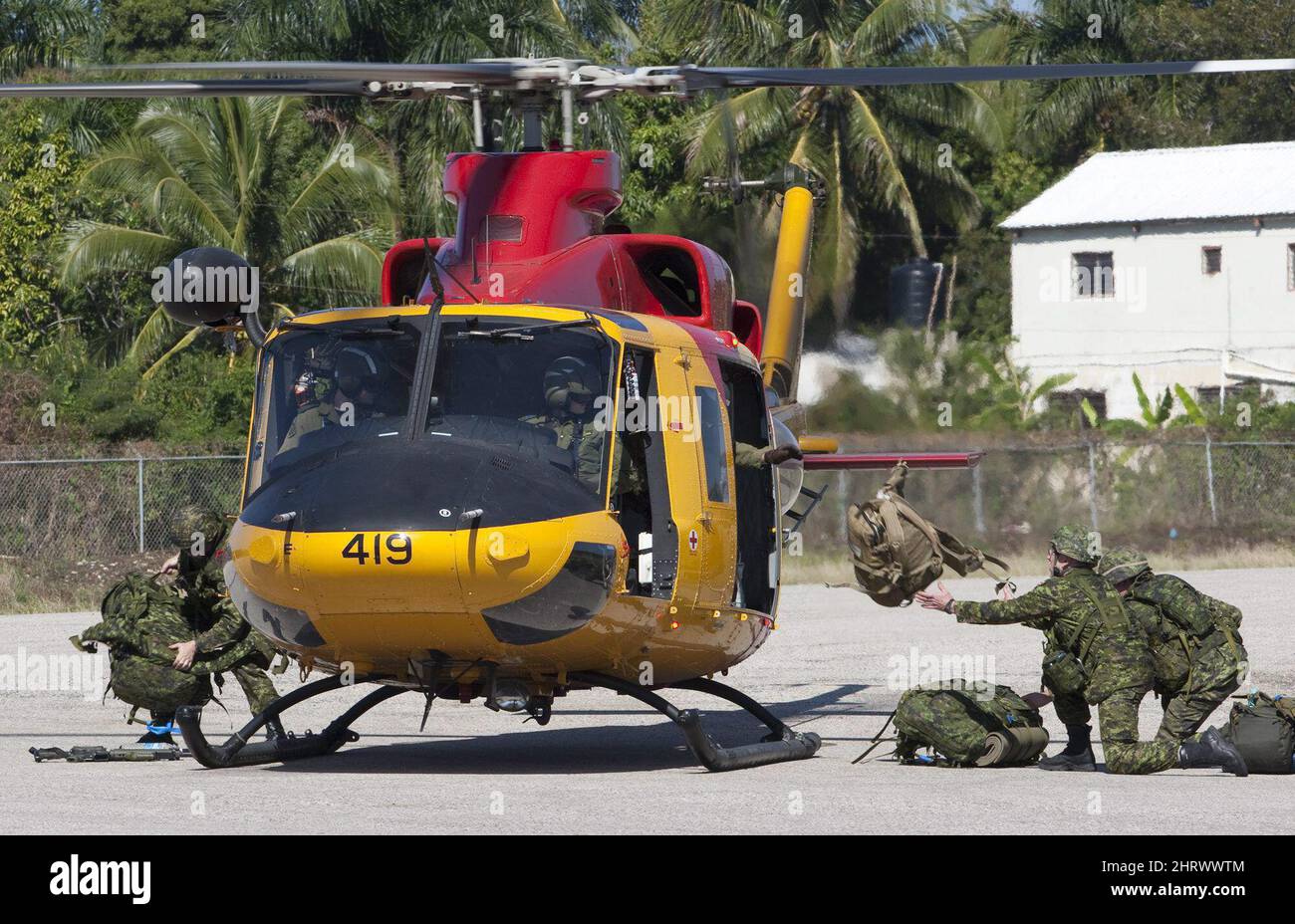 Canadian Forces medical staff take their gear off a Gryffon Search and ...