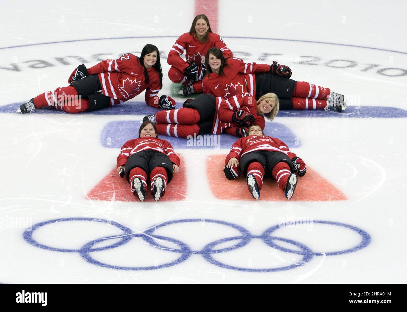Canada's Olympic women's hockey team players Meaghan Mikkelson,top left ...