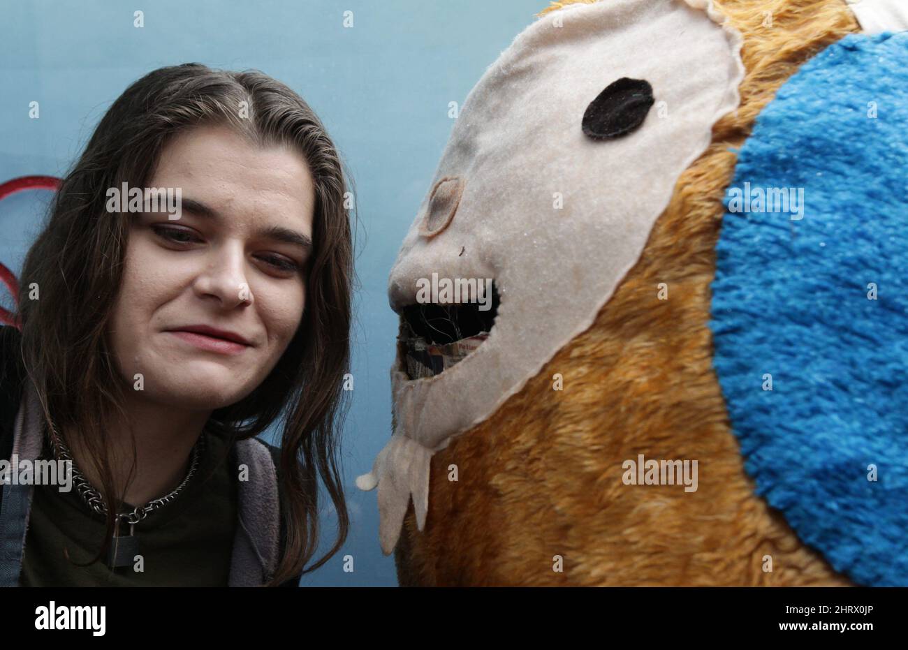 Anti-Olympic activist Alissa Westergard-Thorpe, left, listens to the ...