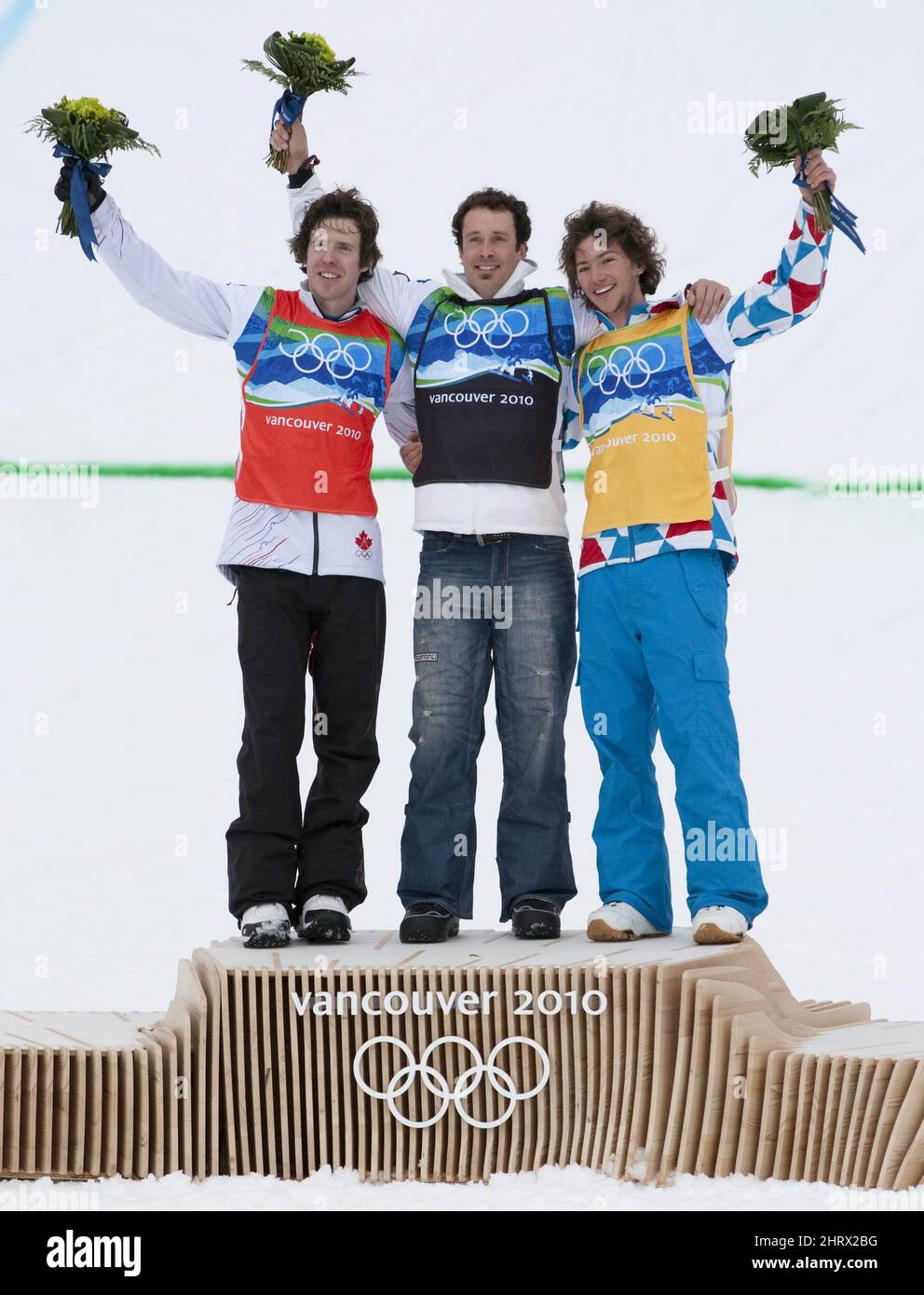 Seth Wescott of the United States, centre, celebrates his gold medal ...
