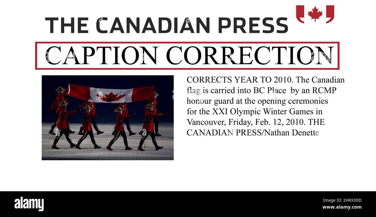CORRECTED VERSION The Canadian flag is carried into BC Place by an RCMP ...