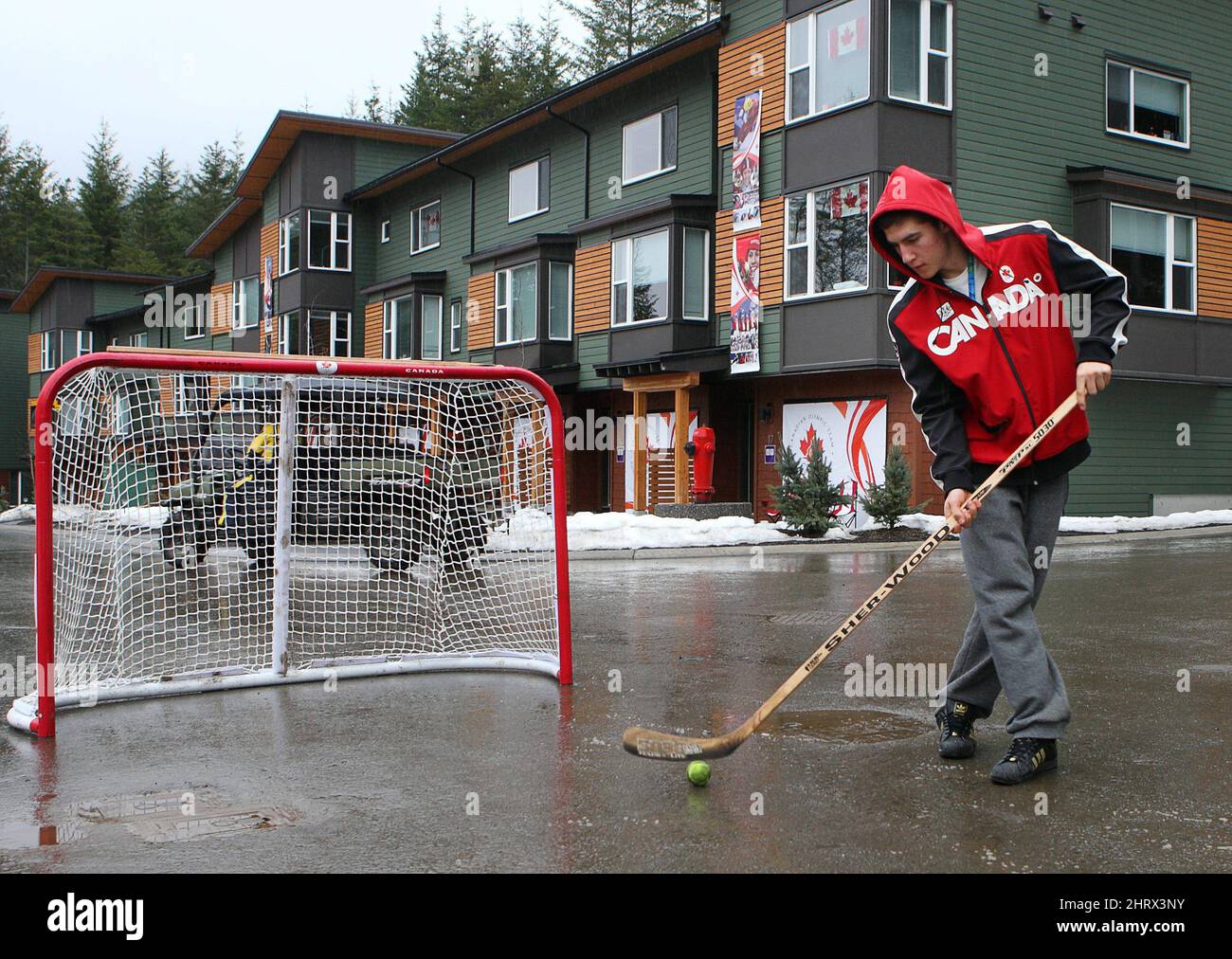 Ski jumper Trevor Morrice, from Calgary, plays road hockey in the ...