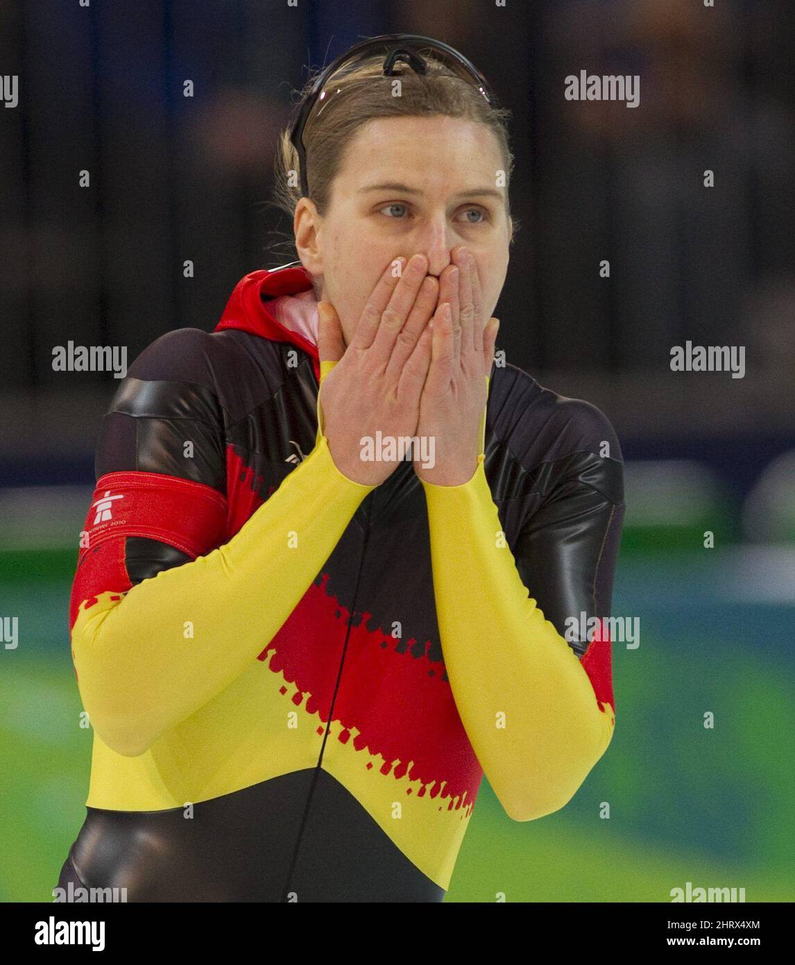 Germany's Jenny Wolf reacts after crossing the finish line to finish in ...