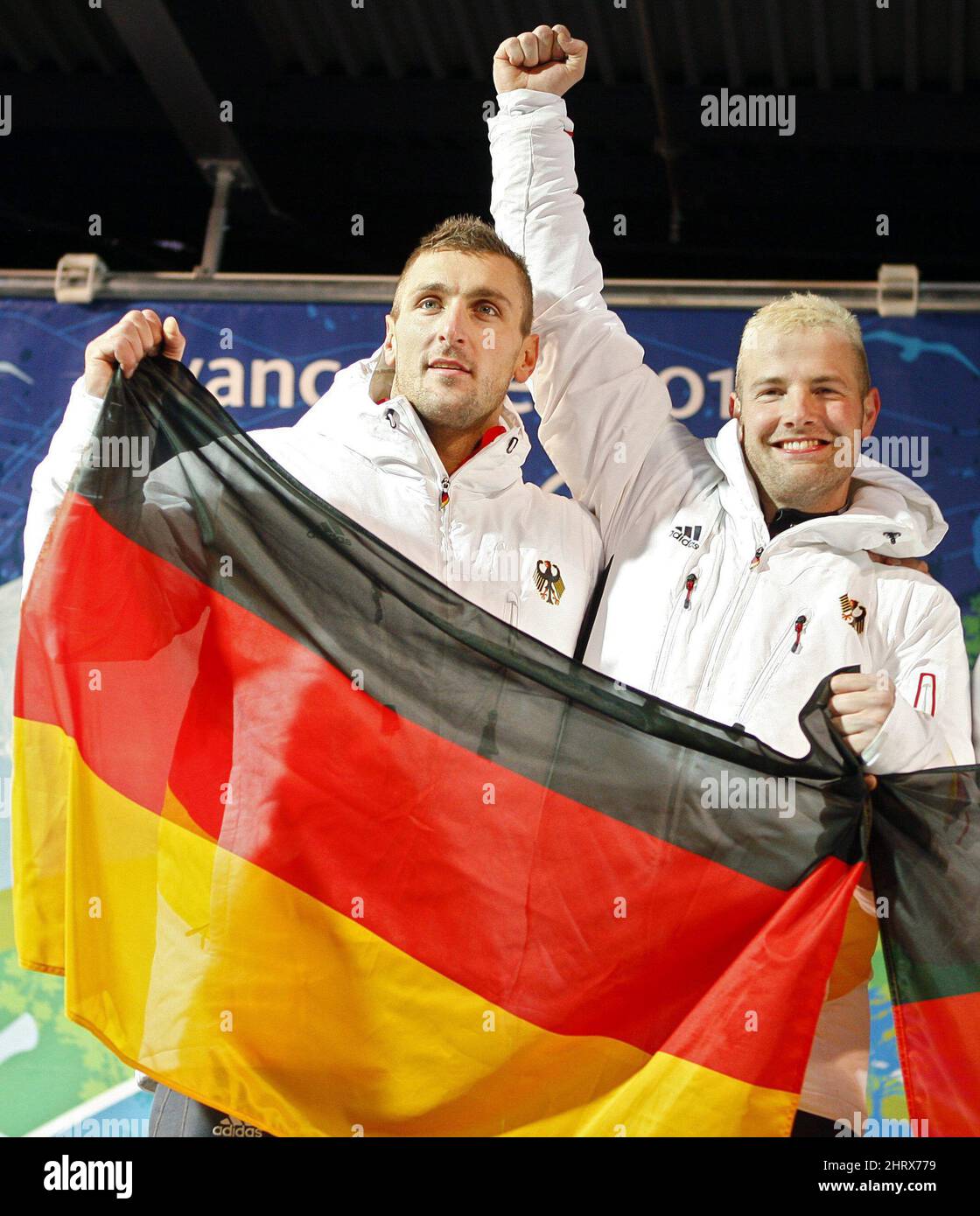 Germany's Andre Lange, right, and Kevin Kuske, celebrate winning a gold ...