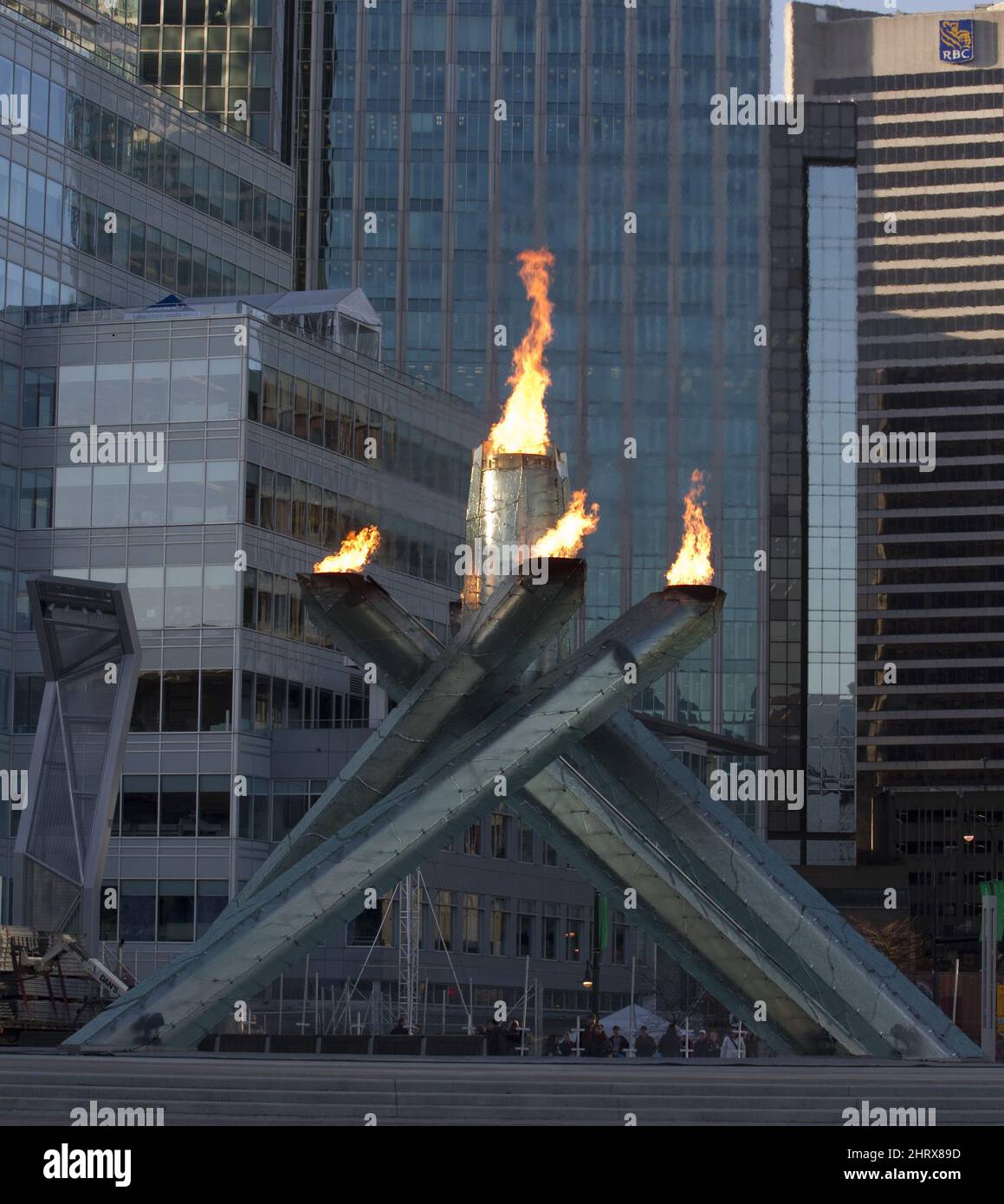 The Olympic cauldron burns at the 2010 Vancouver Winter Olympics Monday ...