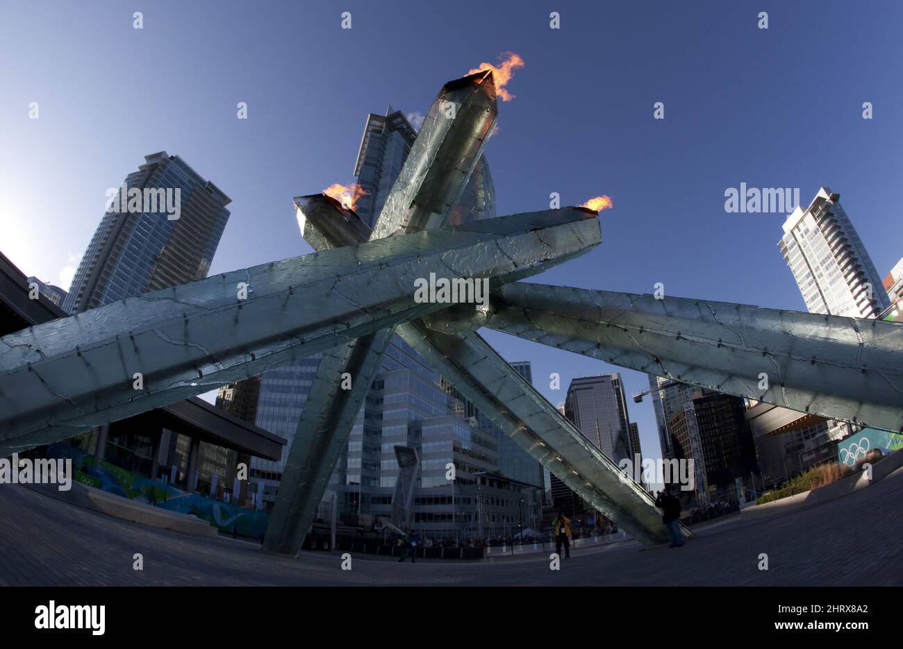 The Olympic cauldron burns at the 2010 Vancouver Winter Olympics Monday ...