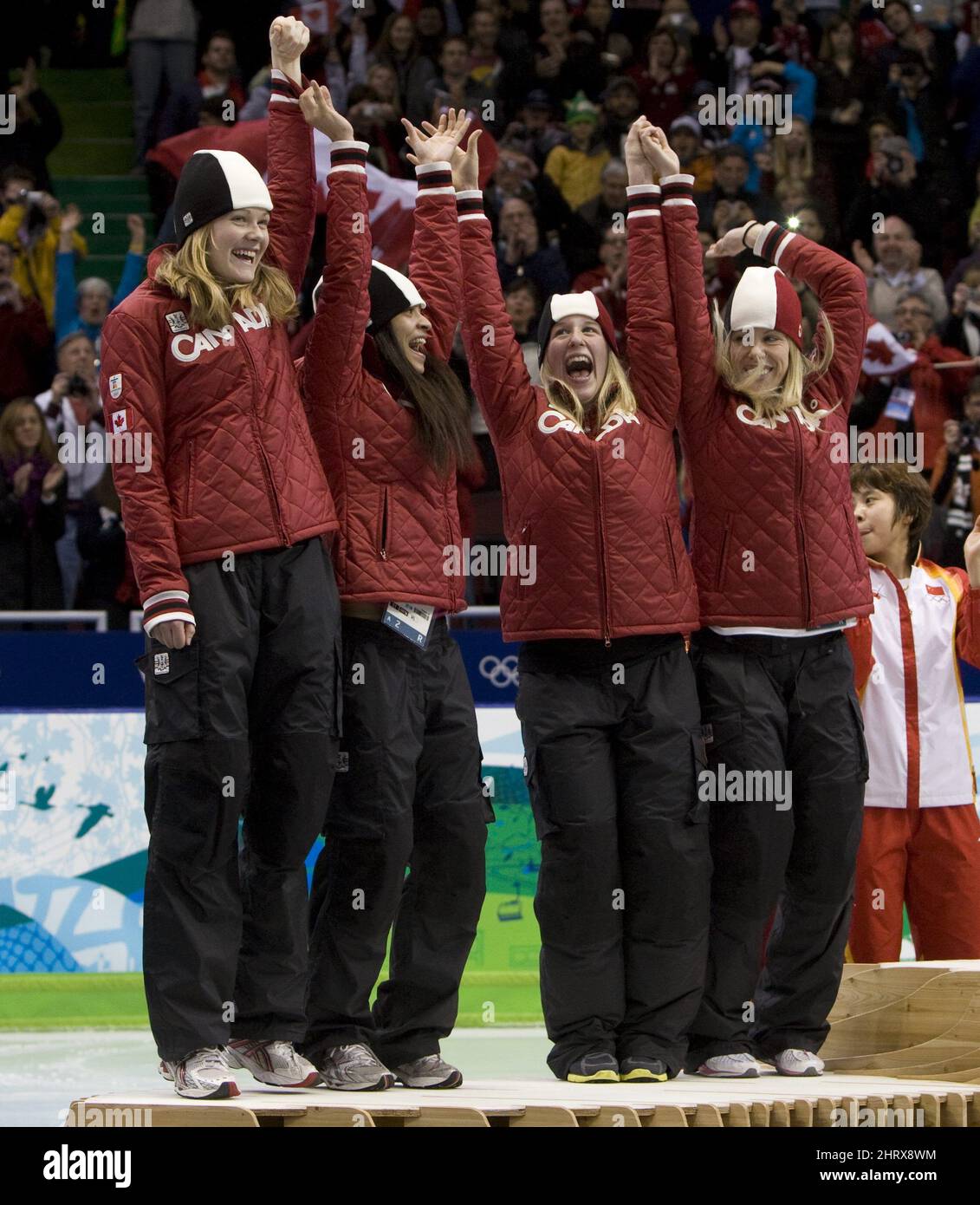 The Canadian women's relay team celebrate after winning the silver ...