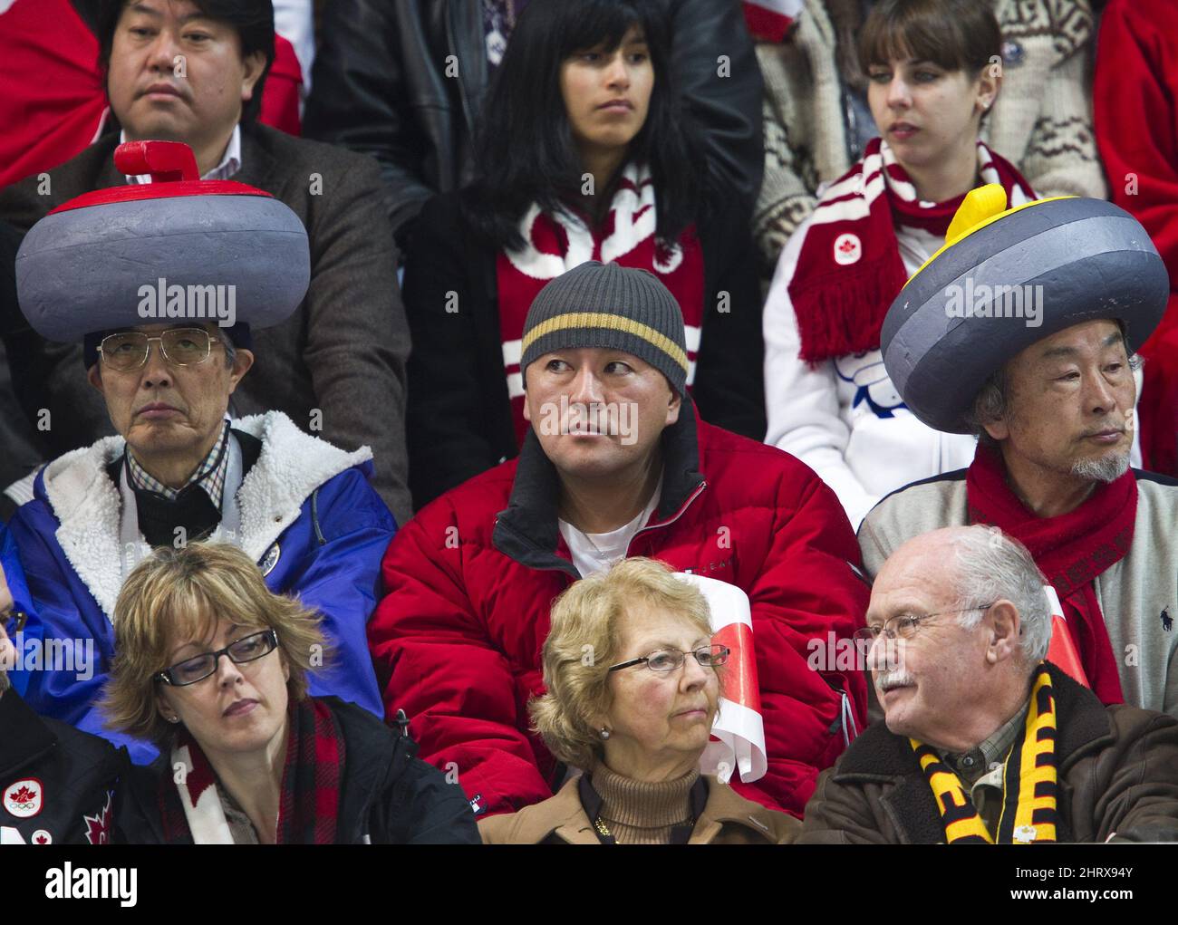Japanese curling fans watch from the stands during Olympic women's ...