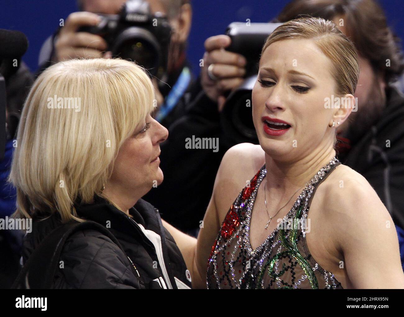 Canada's Joannie Rochette is consoled by coach Manon Perron following ...