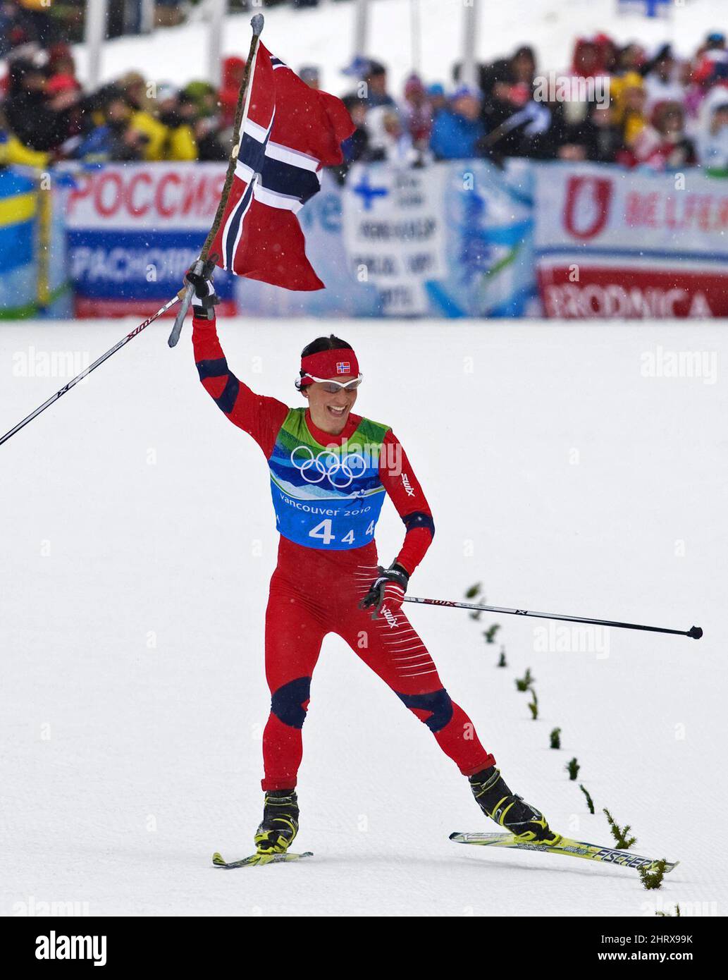 Norway's Marit Bjoergen heads to the finish line as her team wins the ...
