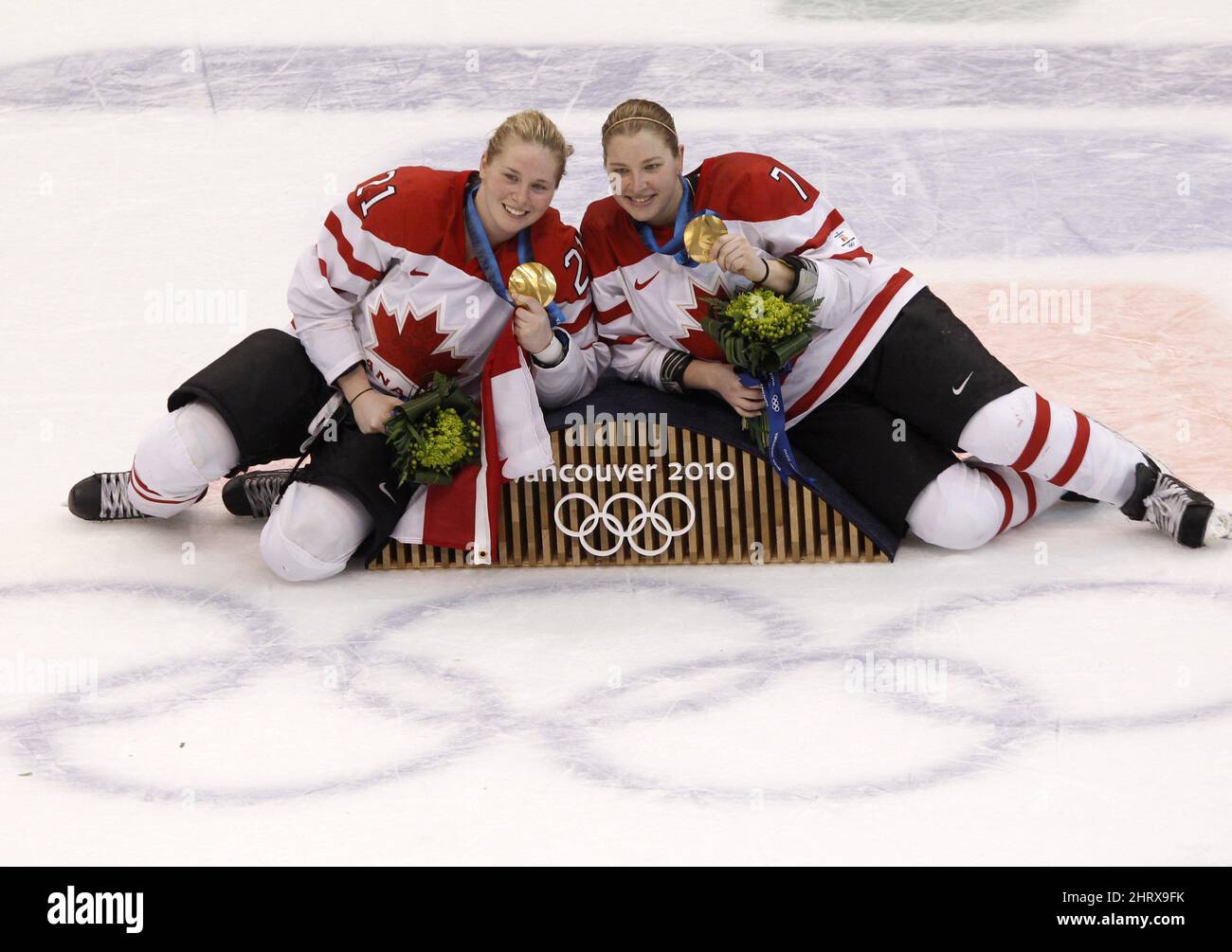 Canada's Haley Irwin and teammate Cherie Piper pose with their gold ...