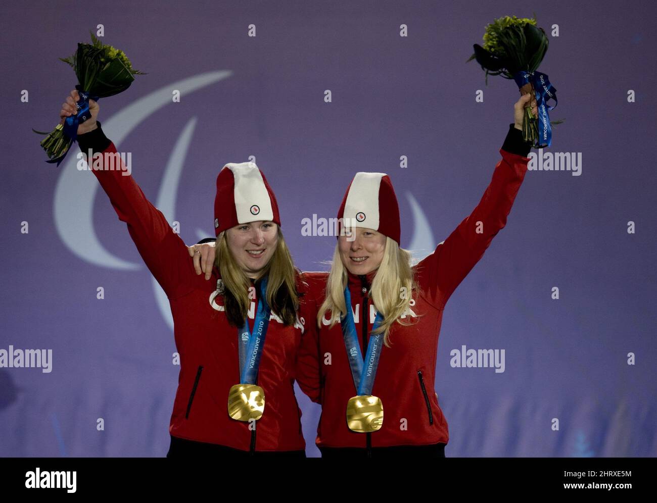 Viviane Forest of Canada, right,and her guide Lindsay Debou celebrate ...