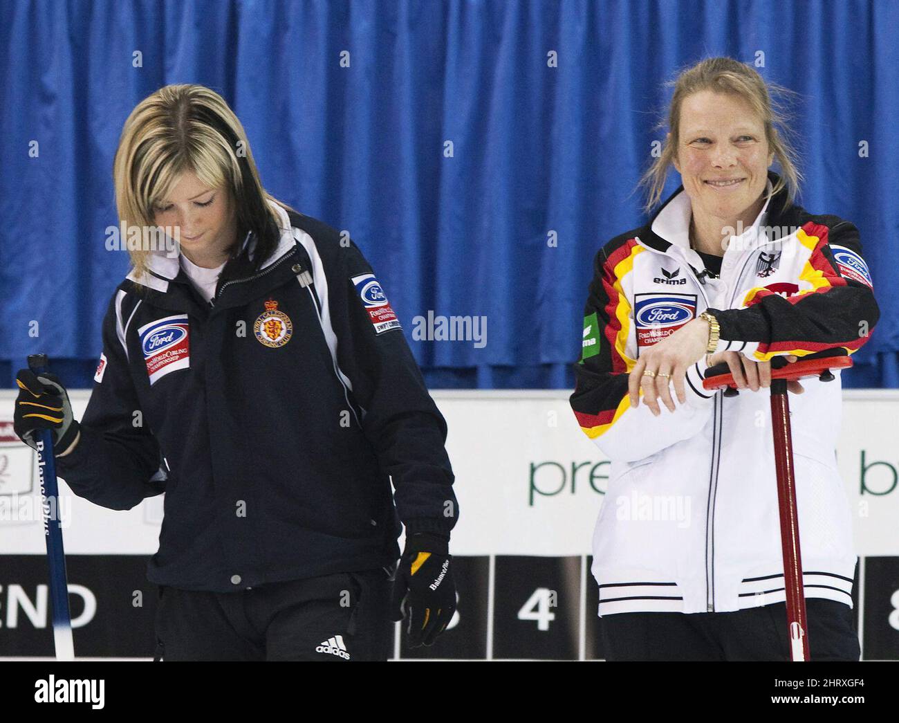 Scotland skip Eve Muirhead, left, looks down as Germany skip Andrea ...