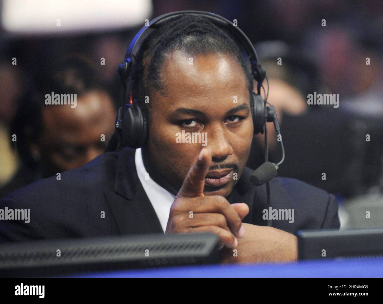 Former undisputed heavyweight boxing champion Lennox Lewis gestures at ...