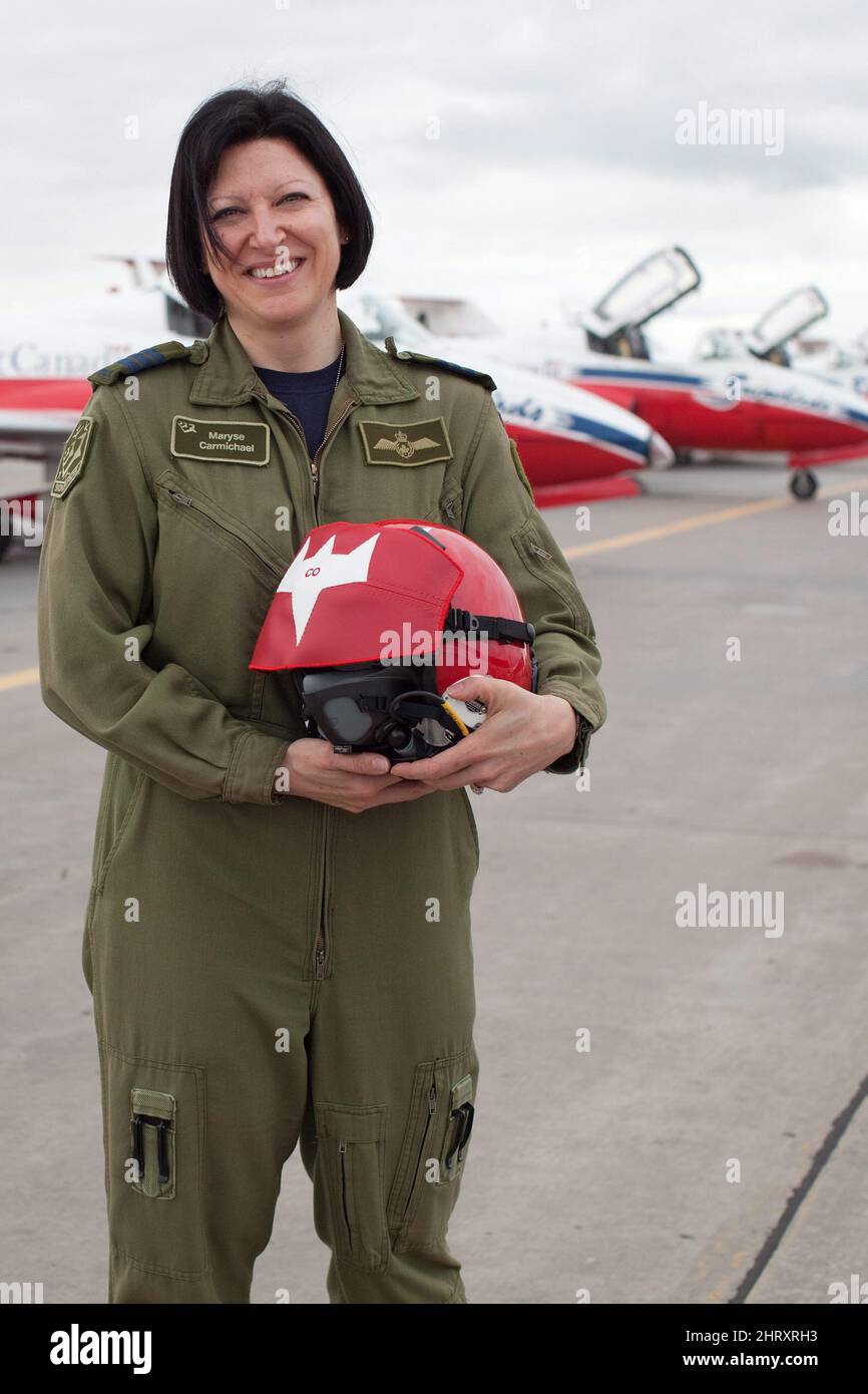 Lieutenant-Colonel Maryse Carmichael poses with her commanding officer ...