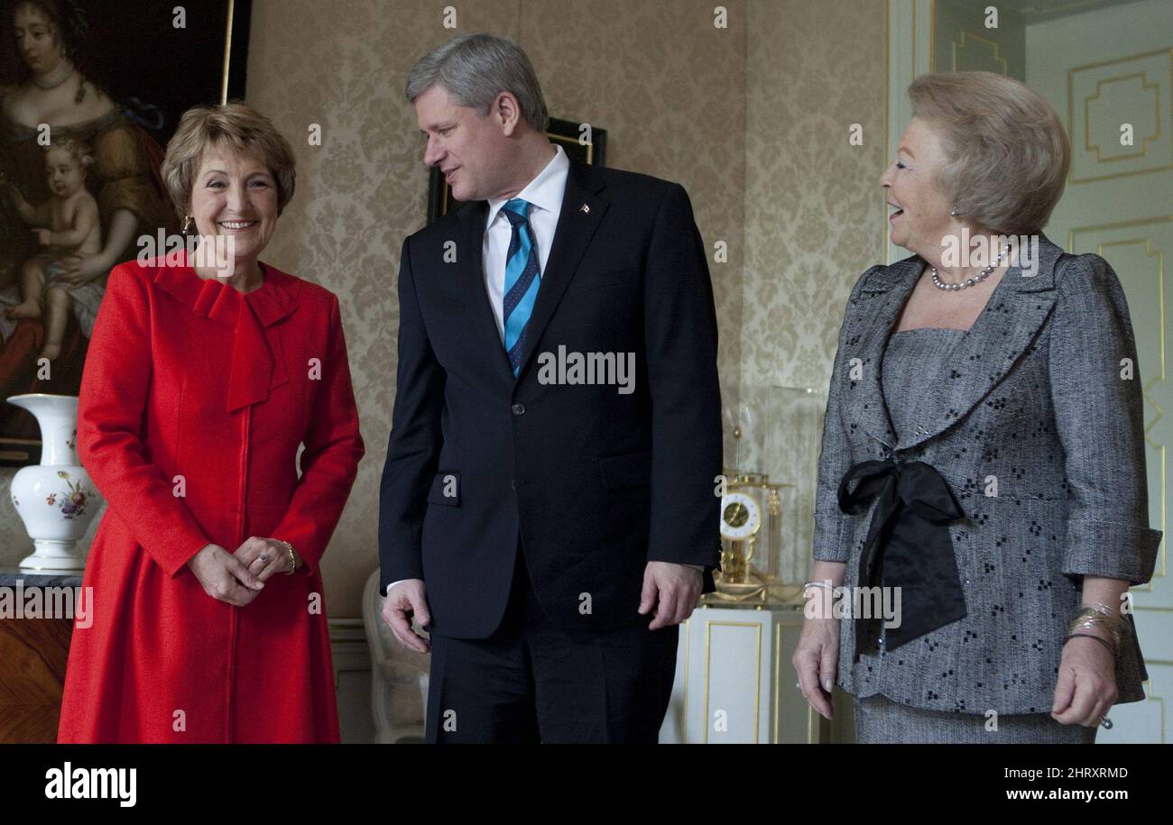 Prime Minister Stephen Harper speaks with Queen Beatrix (right) and and ...