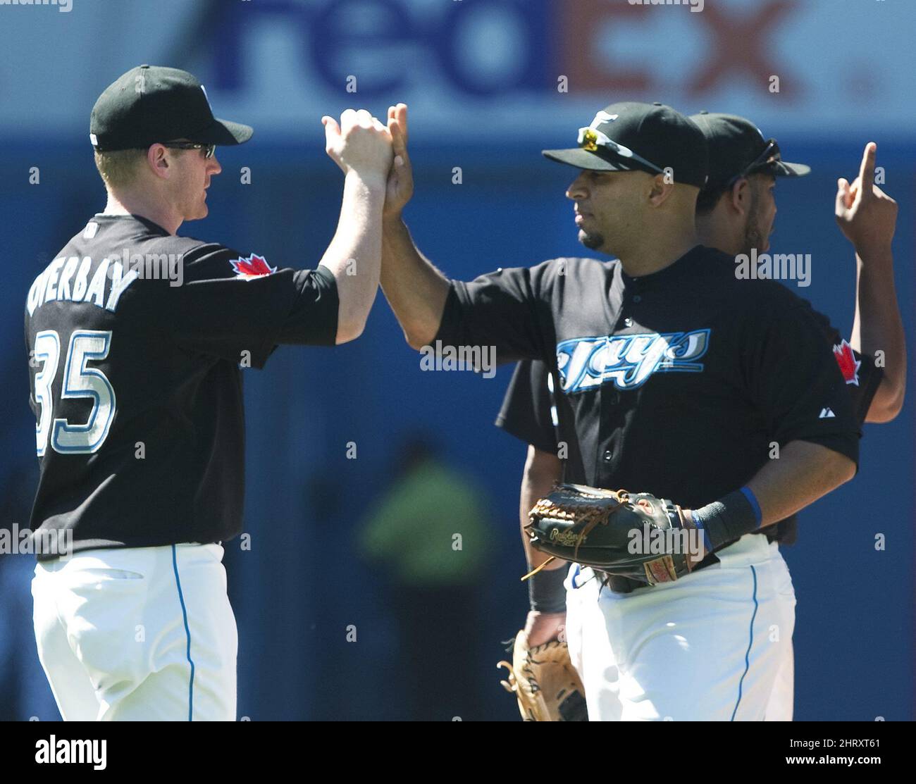 Toronto Blue Jays first baseman Lyle Overbay, left, and Blue Jays ...