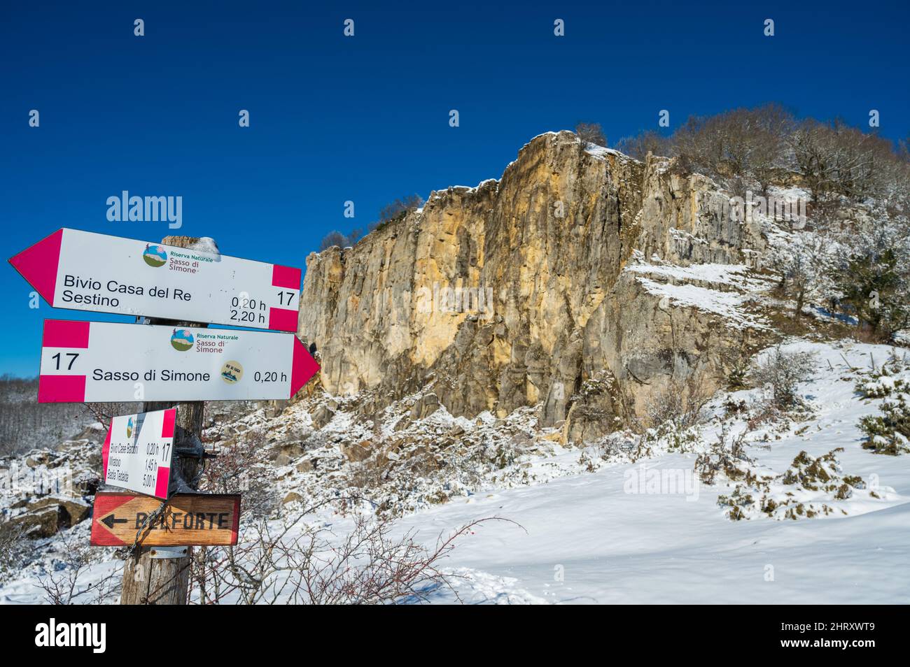 Trail signs indicating the way to Mount Sasso Simone in Carpegna, Italy ...