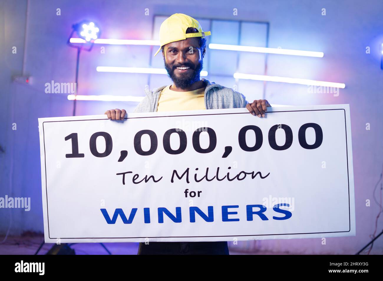 Enjyoing dancer showing winner price money presentation on stage by ...