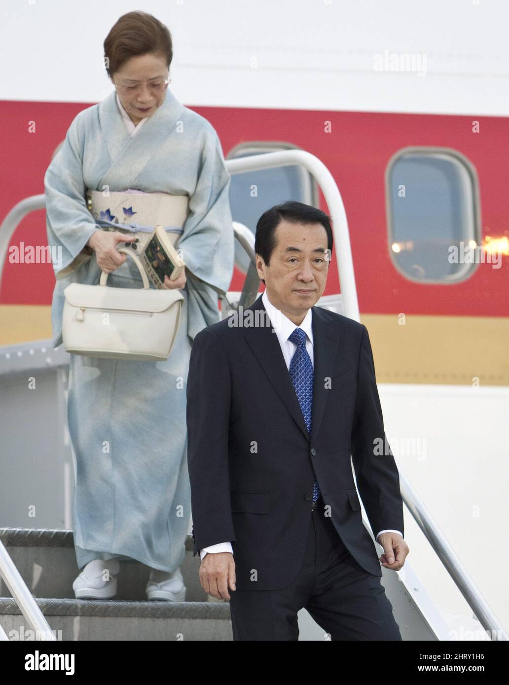 Japan's Prime Minister Naoto Kan and his wife Nobuko arrive to ...