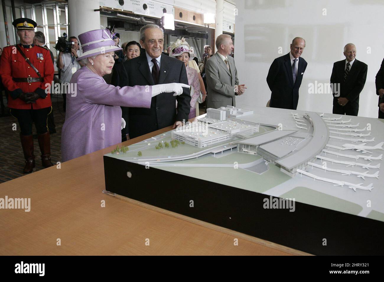 Queen Elizabeth and Arthur Mauro, chair of the Winnipeg Airports ...