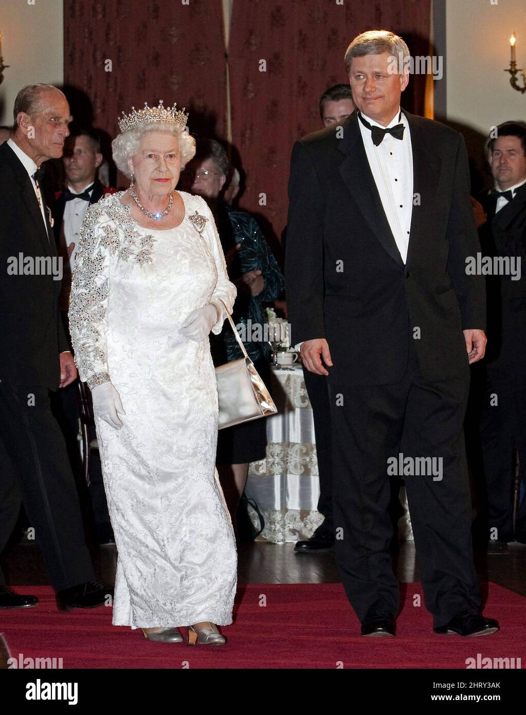 Queen Elizabeth II and Prime Minister Stephen Harper arrive for a state ...