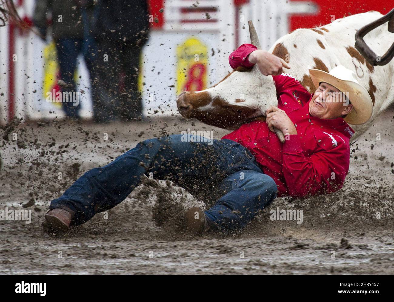 Cody Cassidy, from Donalda, Alta., splashes through the mud during ...