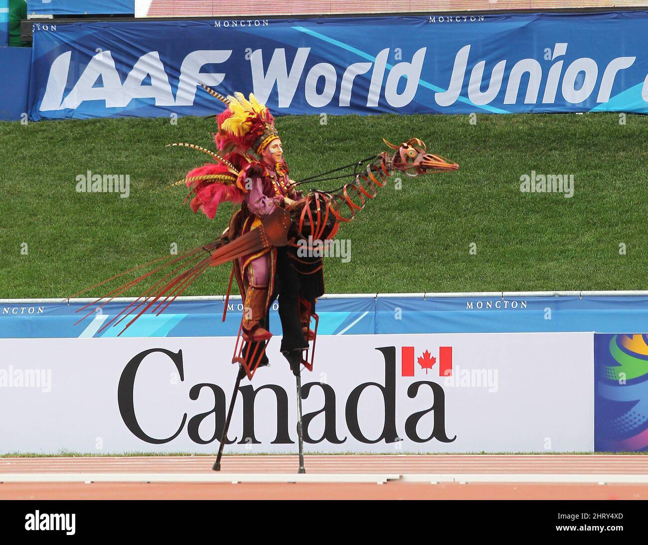 A dancer walks around the University of Moncton Stadium track on Monday ...