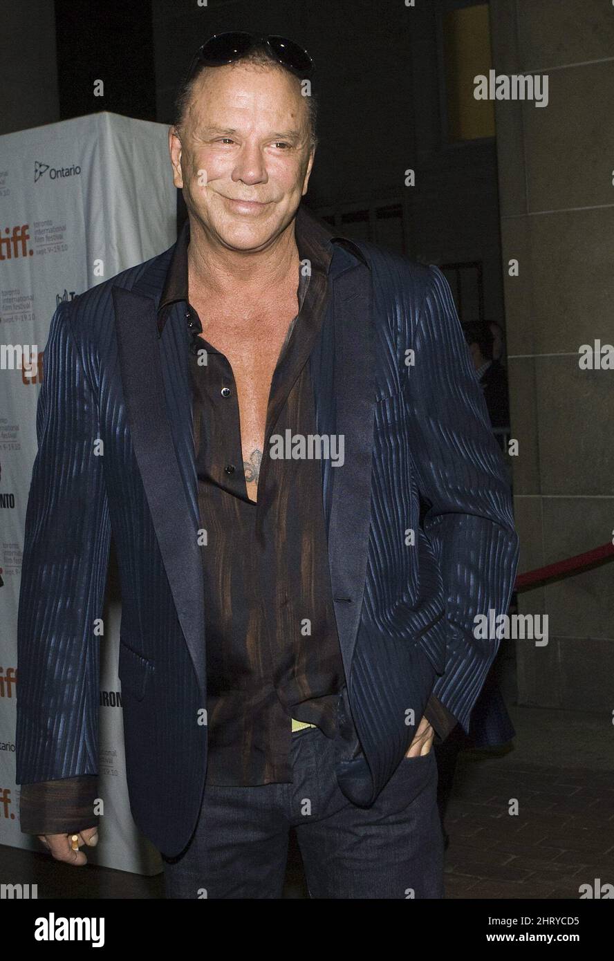 Actor Mickey Rourke poses for a photograph on the red carpet for the ...