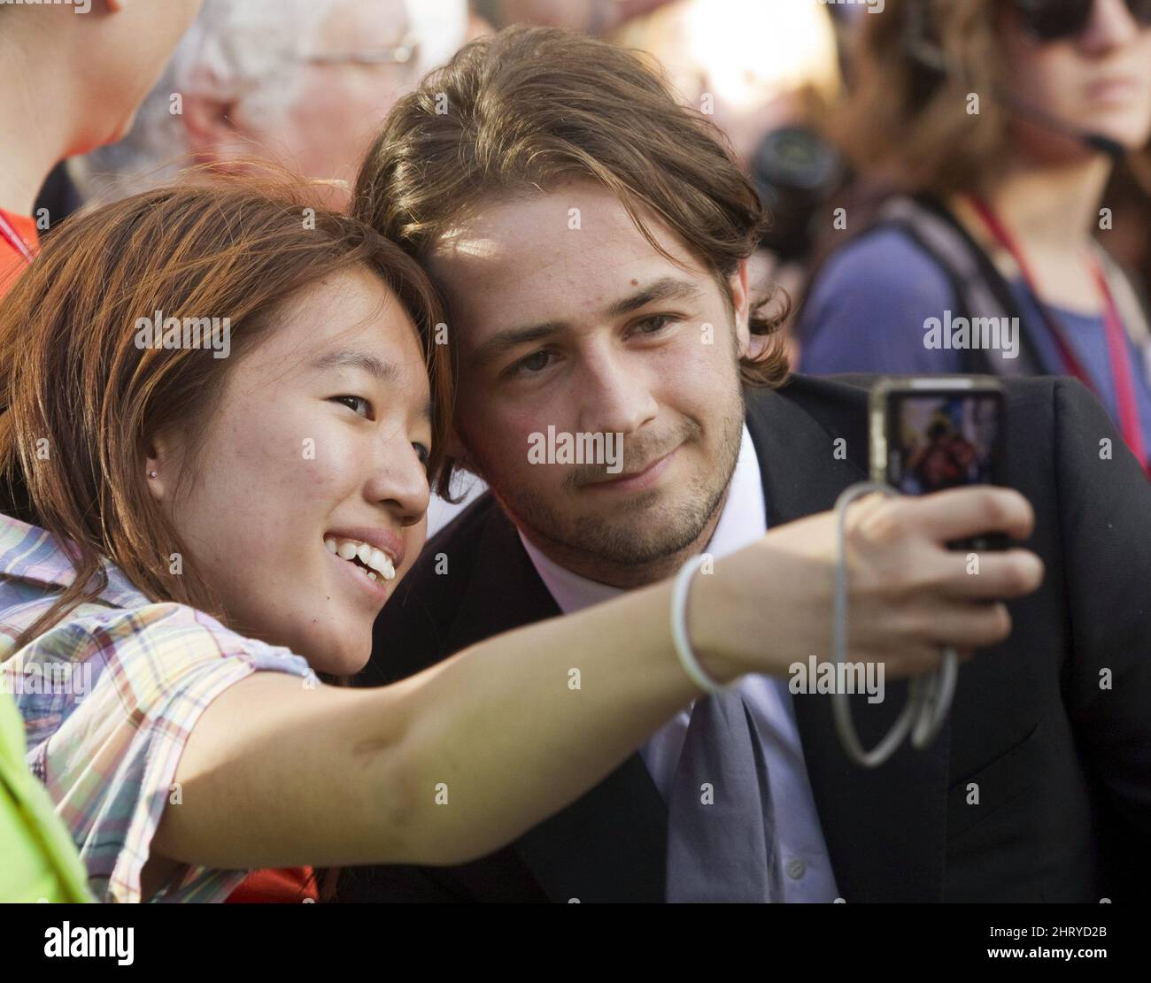 Reece Thompson poses for a photo with a fan as he arrives for the gala ...