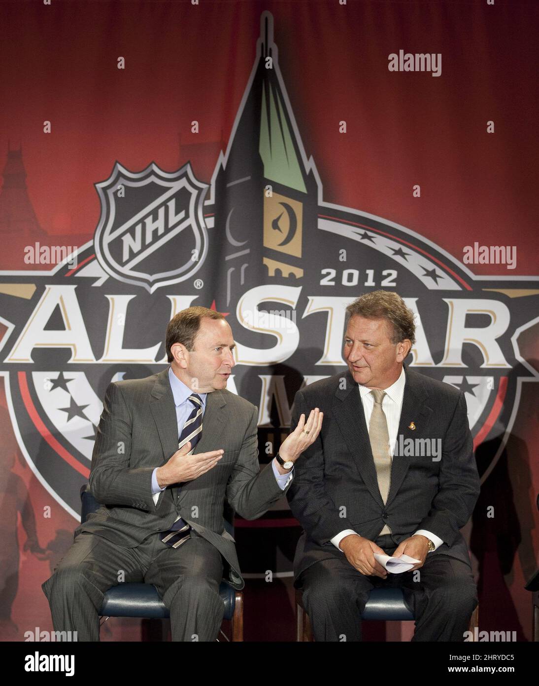 NHL Commissioner Gary Bettman speaks with Ottawa Senators owner Eugene ...