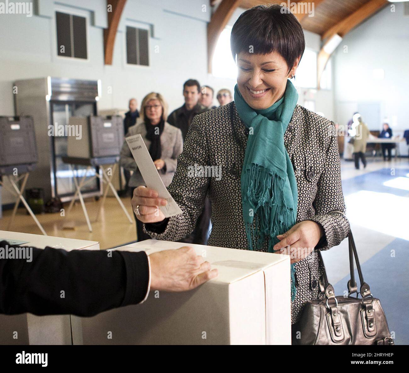 Calgary mayoral candidate and former TV anchor Barb Higgins casts her ...